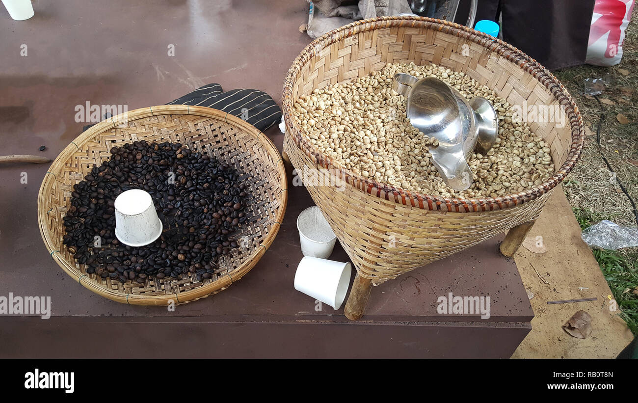 The coffee beans on a threshing basket Stock Photo - Alamy
