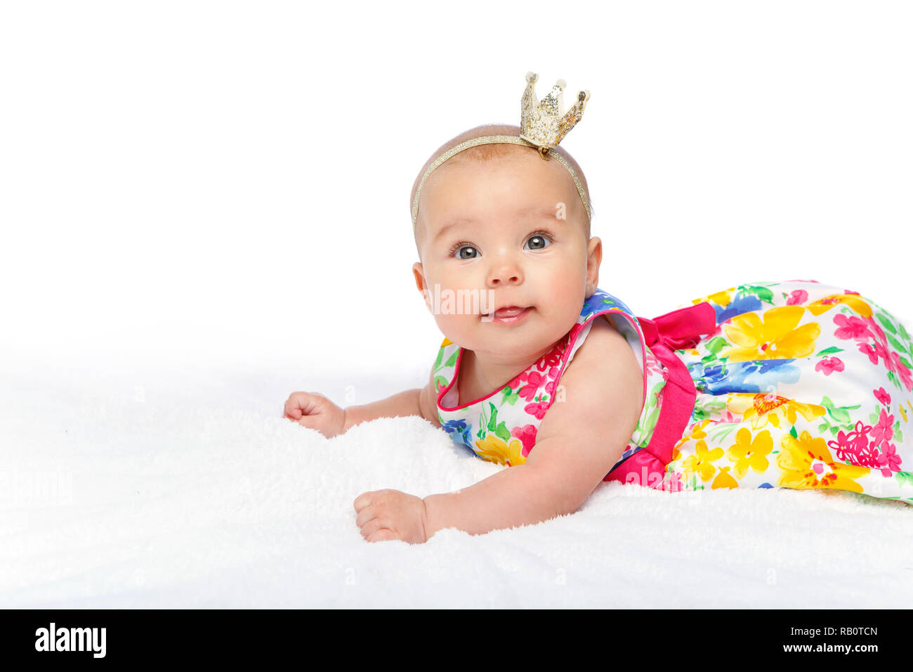 happy beautiful baby girl with crown on head Stock Photo - Alamy