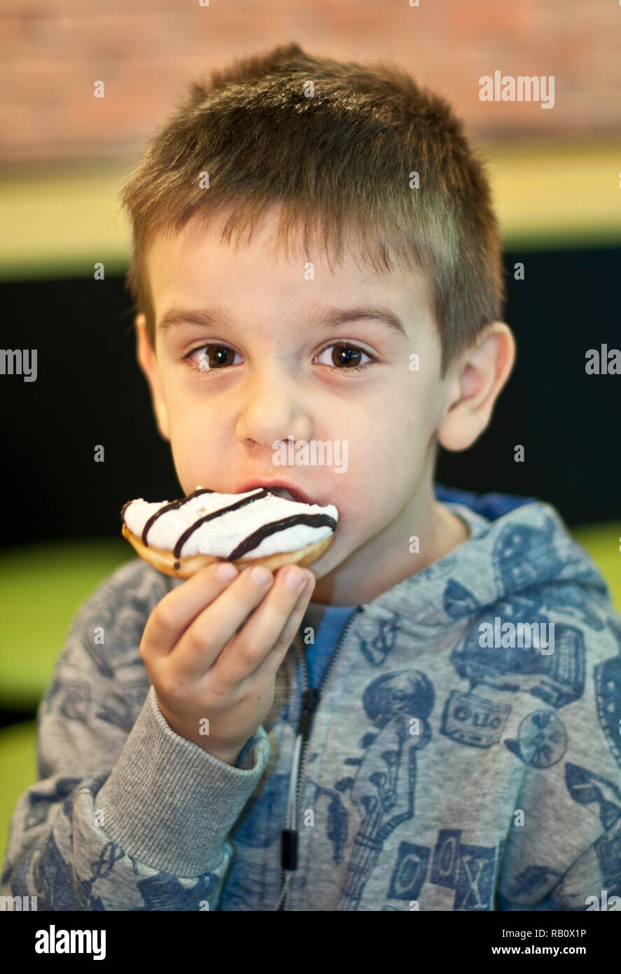 Eat donut hi-res stock photography and images - Alamy