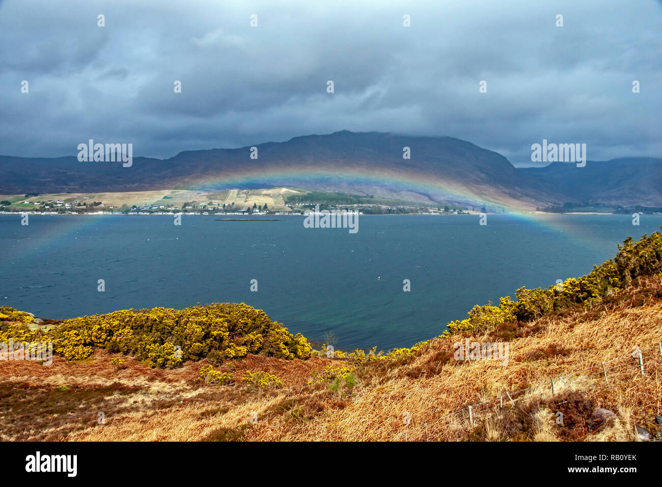 Lochcarron village in Highland Scotland across Loch Carron viewed from ...