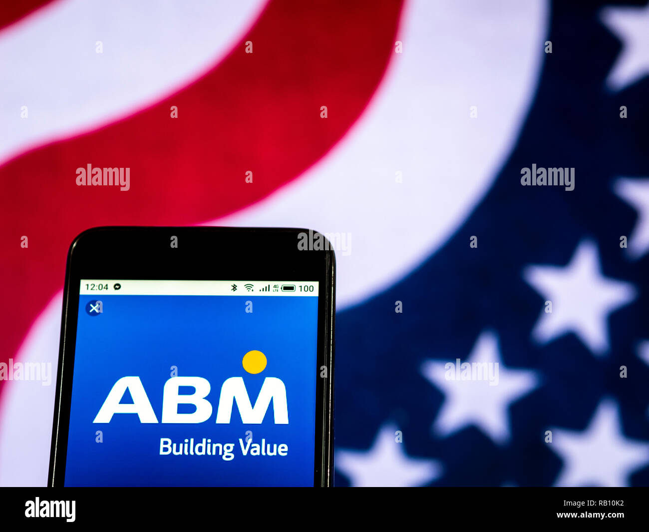 ABM Industries Facility management company logo seen displayed on smart ...