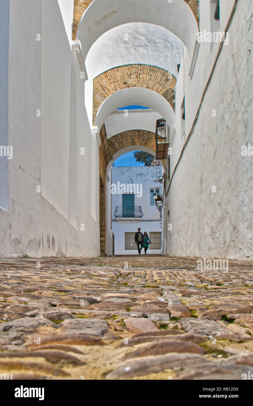 Beautiful street with arches in Vejer de la Frontera, Spain Stock Photo ...