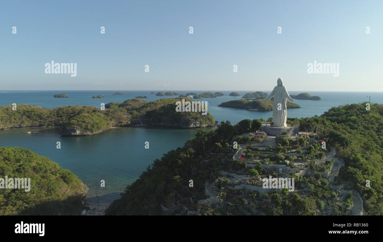 Statue of Jesus Christ on Pilgrimage island in Hundred Islands National ...