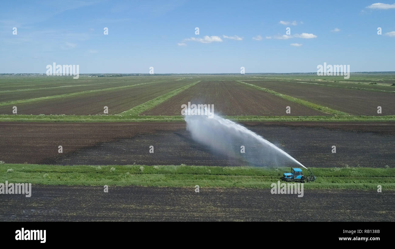 Aerial view of Crop Irrigation using the center pivot sprinkler system ...