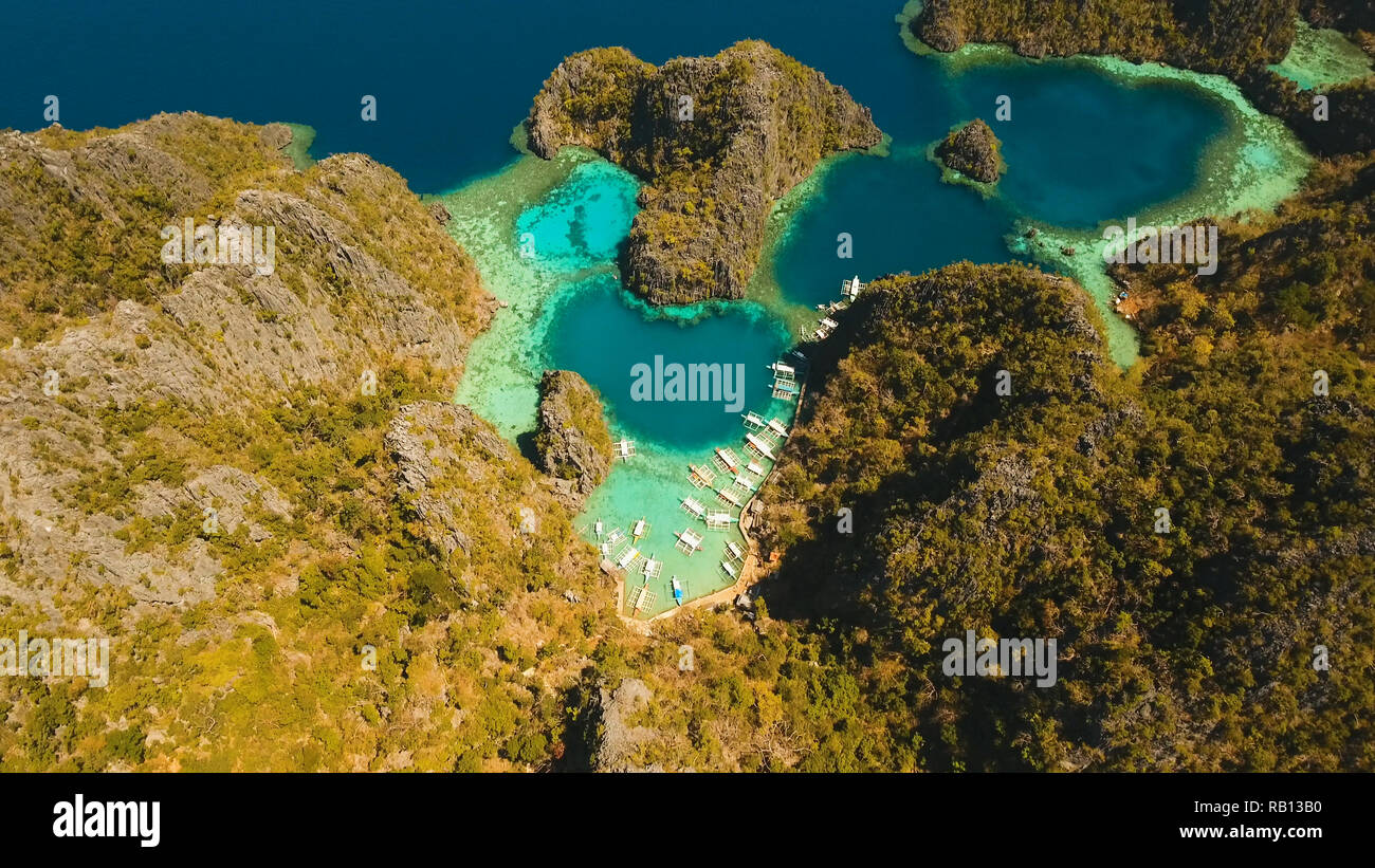 Tropical lagoon with azure water, beach Kayangan Lake, Philippines. Aerial view Coron island ...