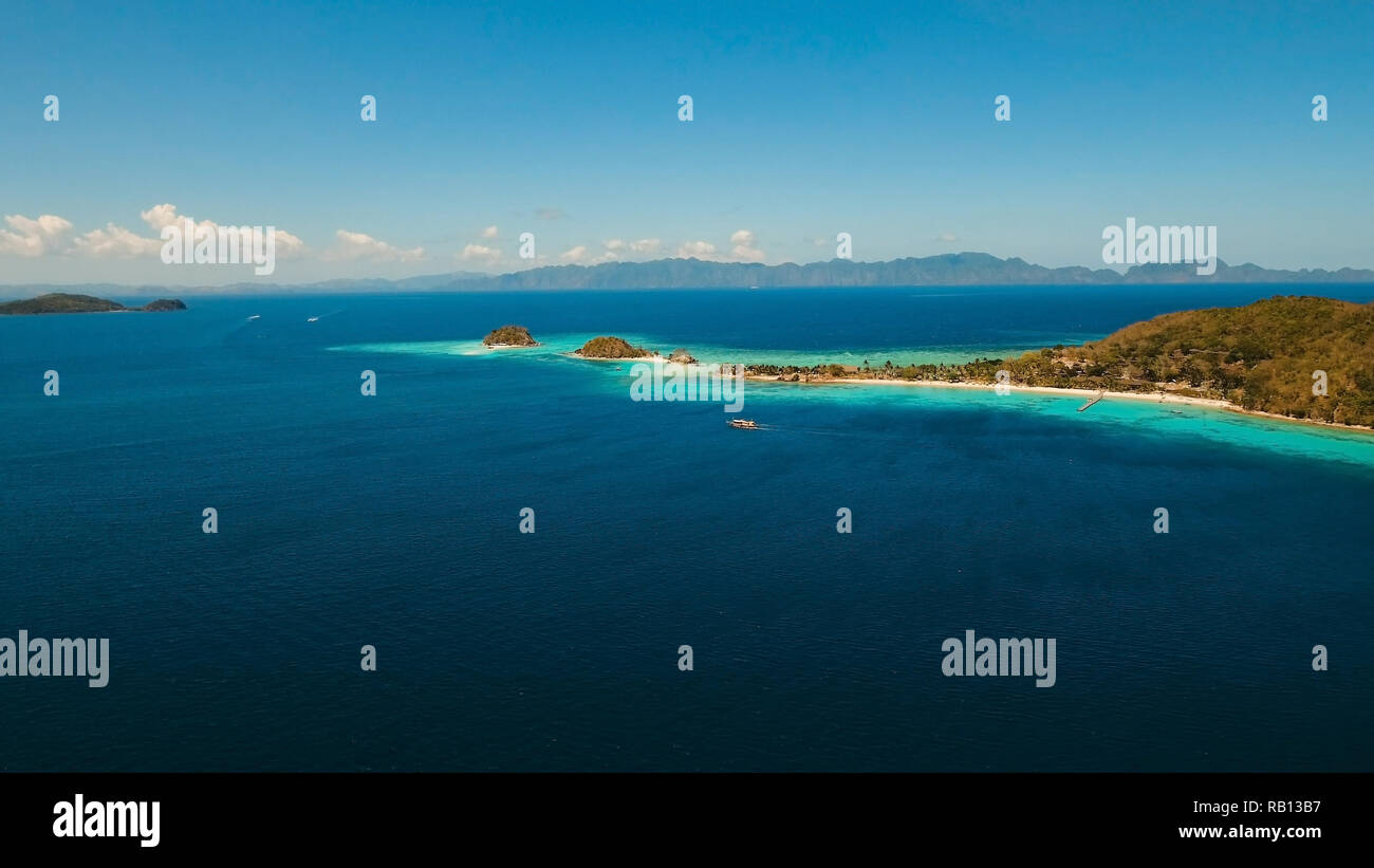 Aerial view: Lagoon with blue, azure water in the middle of small ...