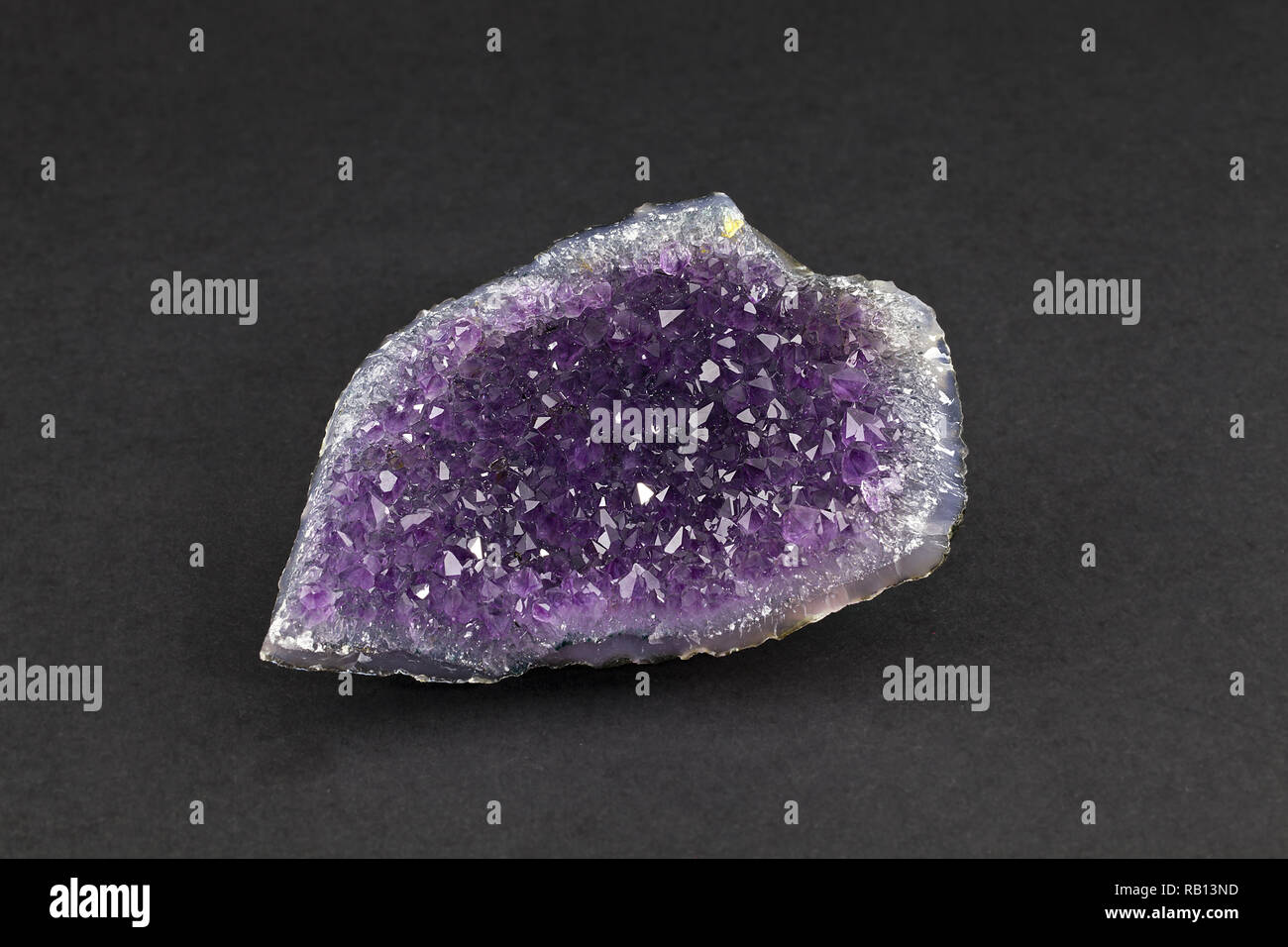 amethyst geode on a black fon Stock Photo - Alamy