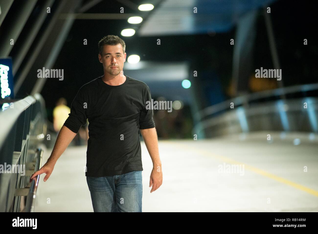 Australian man poses for picture in Brisbane, Australia. Brisbane is ...