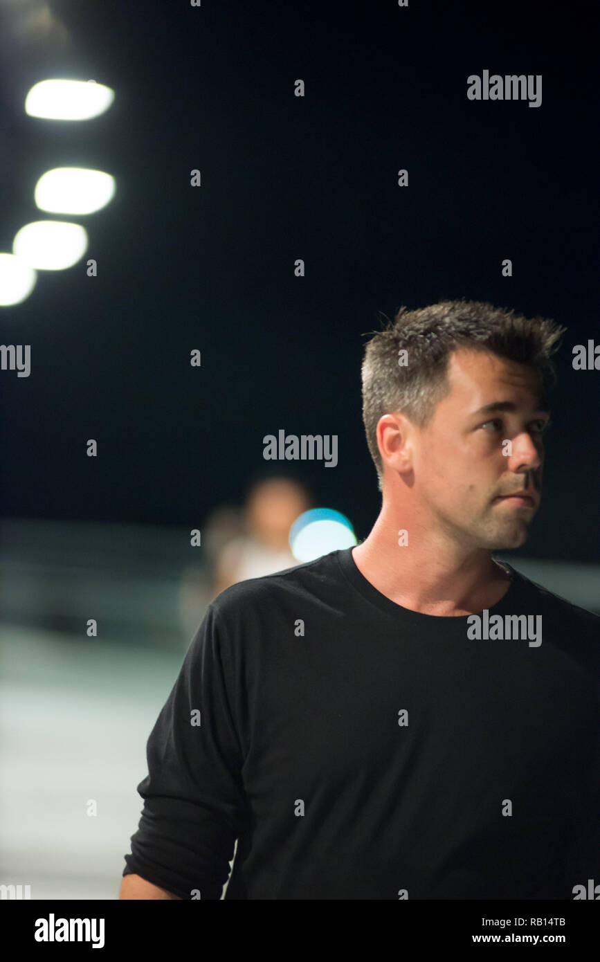 Australian man poses for picture in Brisbane, Australia. Brisbane is ...