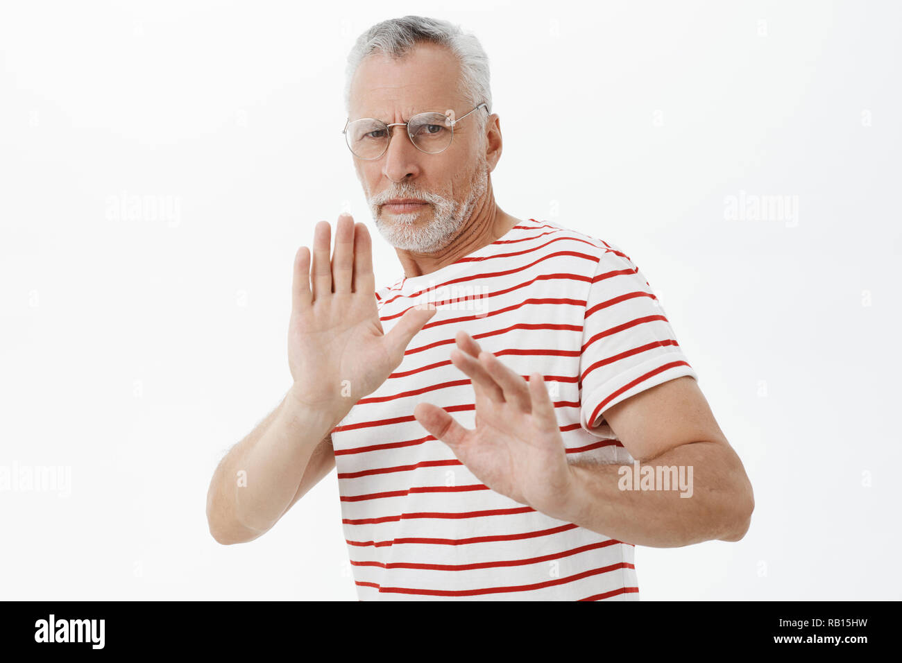 Defensive gesture hi-res stock photography and images - Alamy