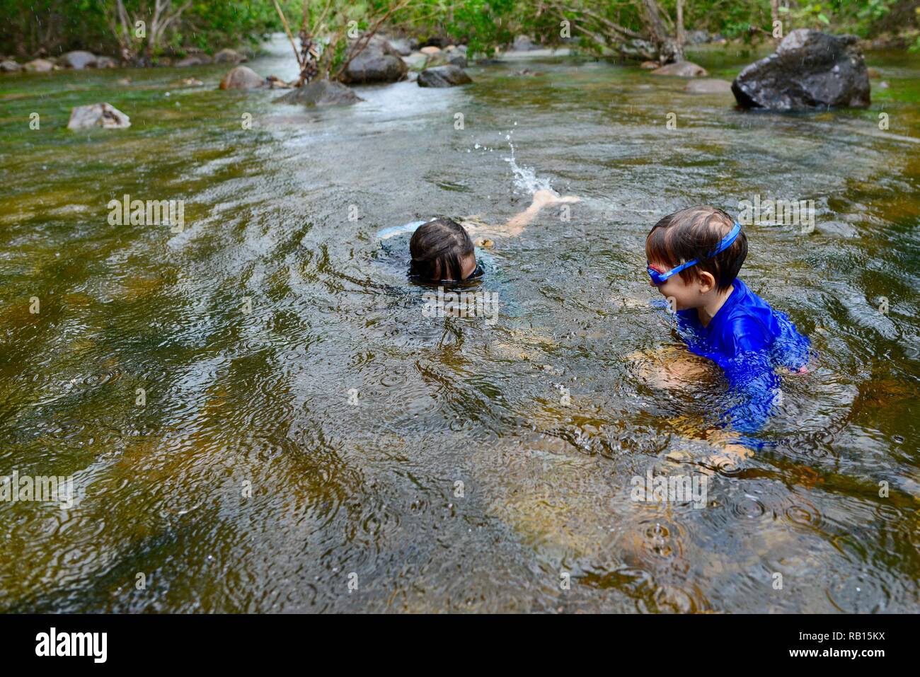 Kids swimming in a stream hi-res stock photography and images - Alamy