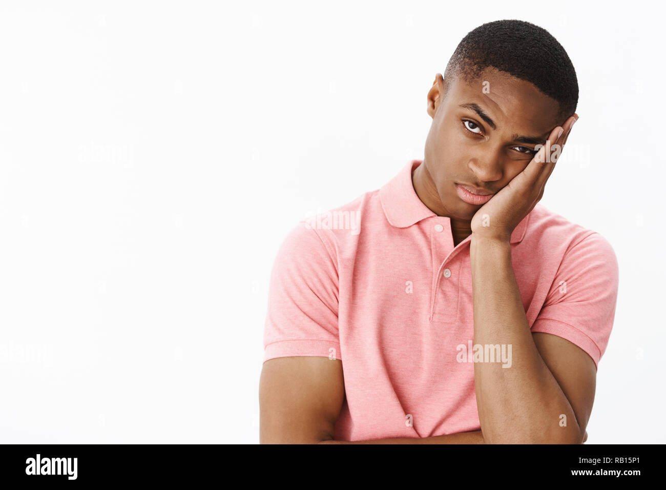 How long it lasts. Bored and indifferent displeased young african ...