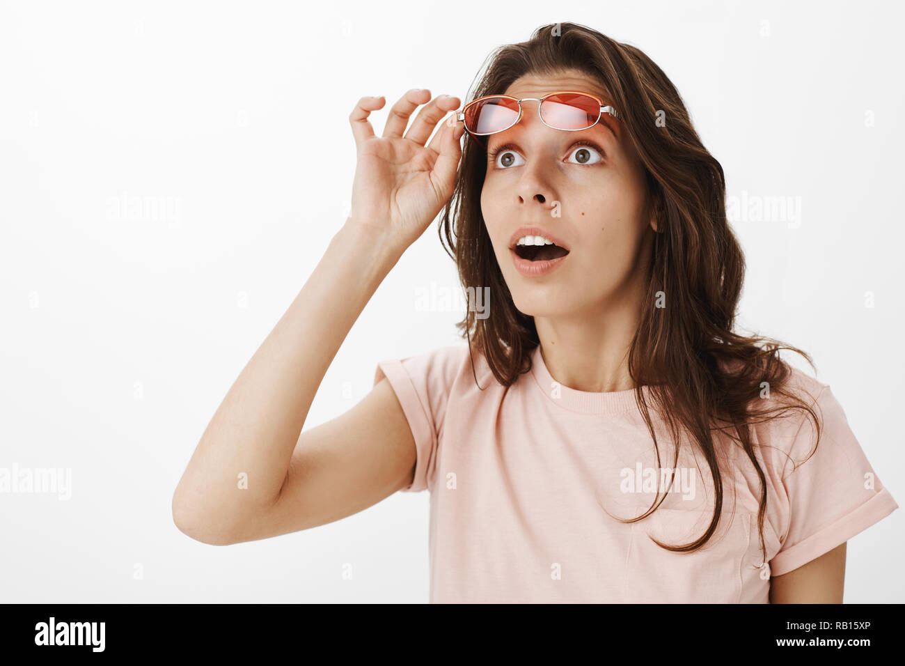 Woman taking sunglasses off hi-res stock photography and images - Alamy