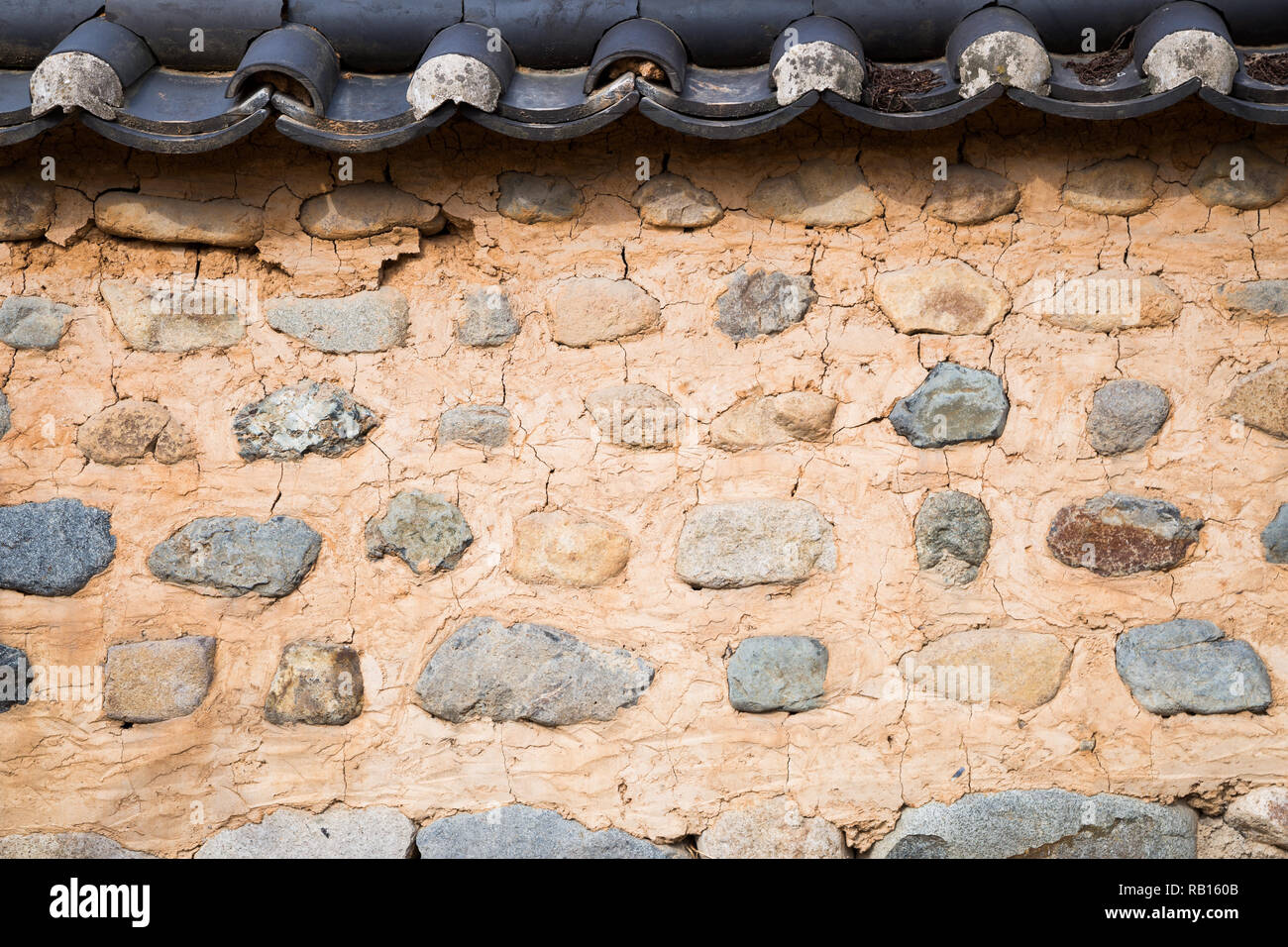 Korean traditional stone wall background texture Stock Photo - Alamy