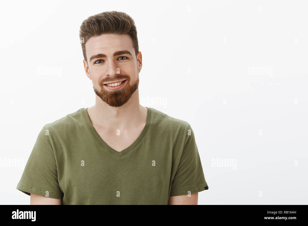 Close-up shot of nice romantic and cute boyfriend with beard gazing ...