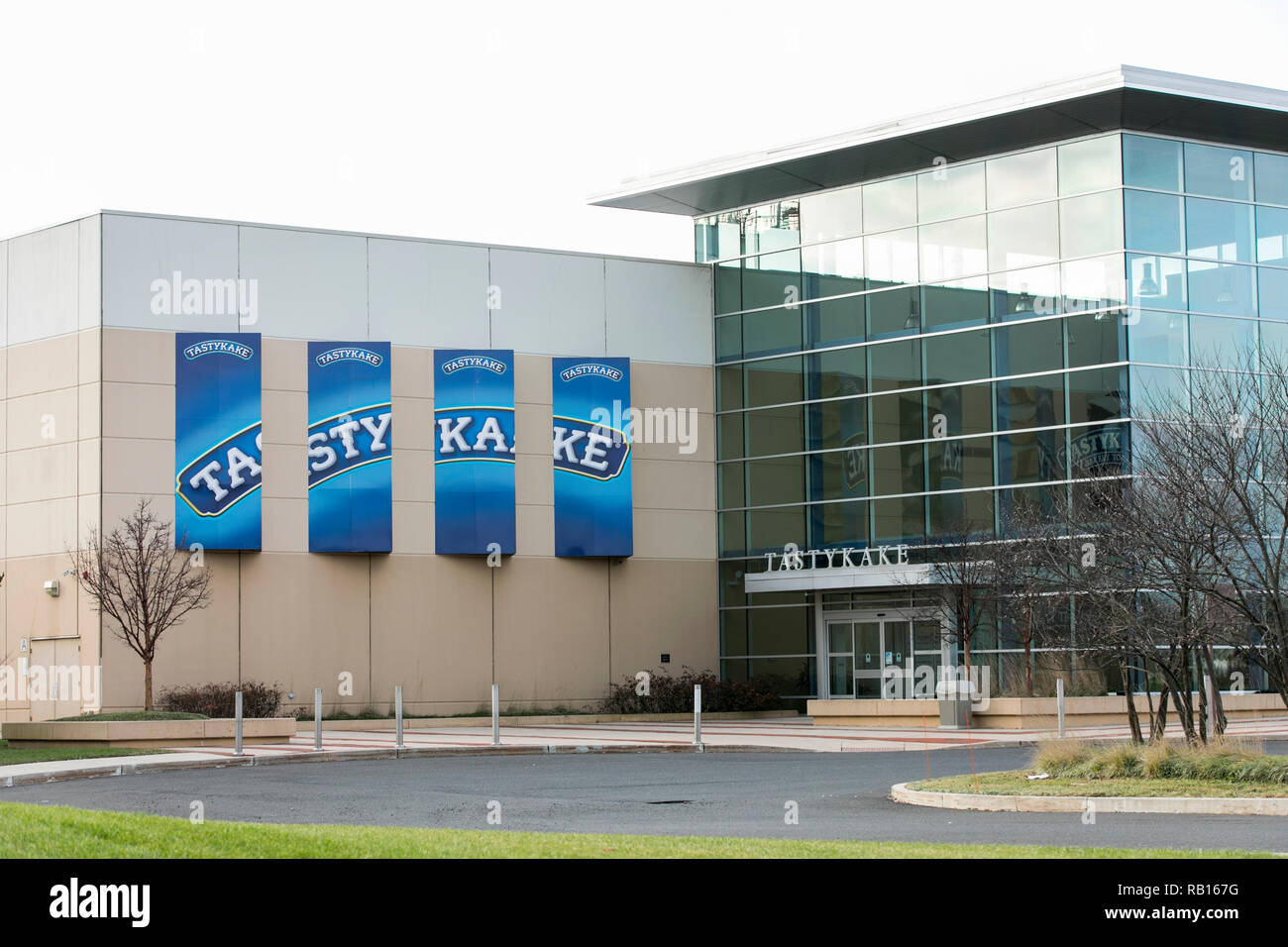 A logo sign outside of the headquarters of the Tasty Baking Company ...