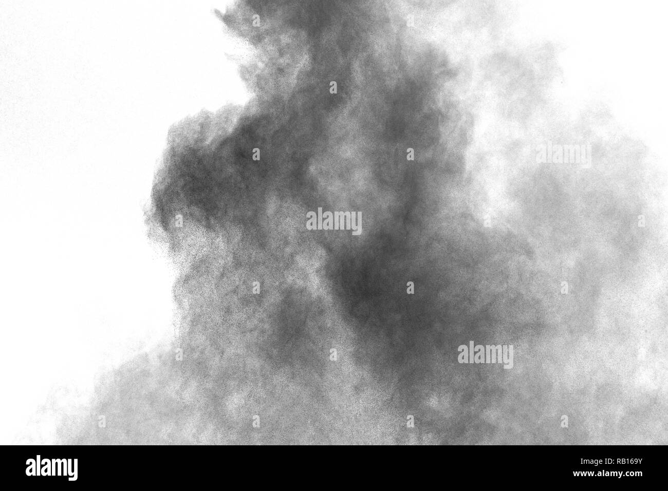 Closeup of black dust particles explode isolated on white background ...