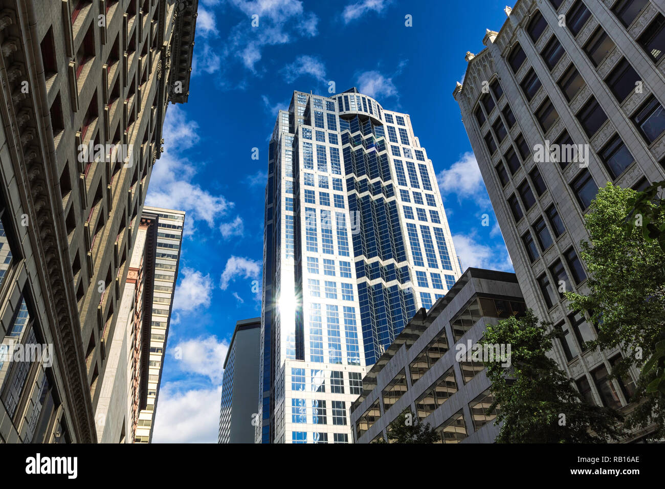 Seattle downtown buildings and a sun reflection in a glass skyscraper ...