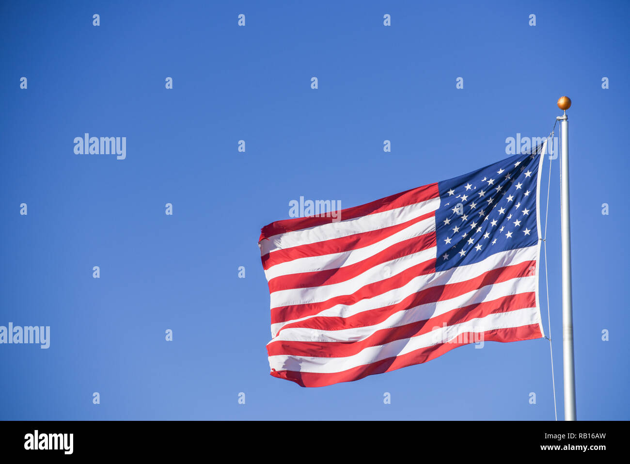 Flying the Flag of the United States of America Stock Photo - Alamy