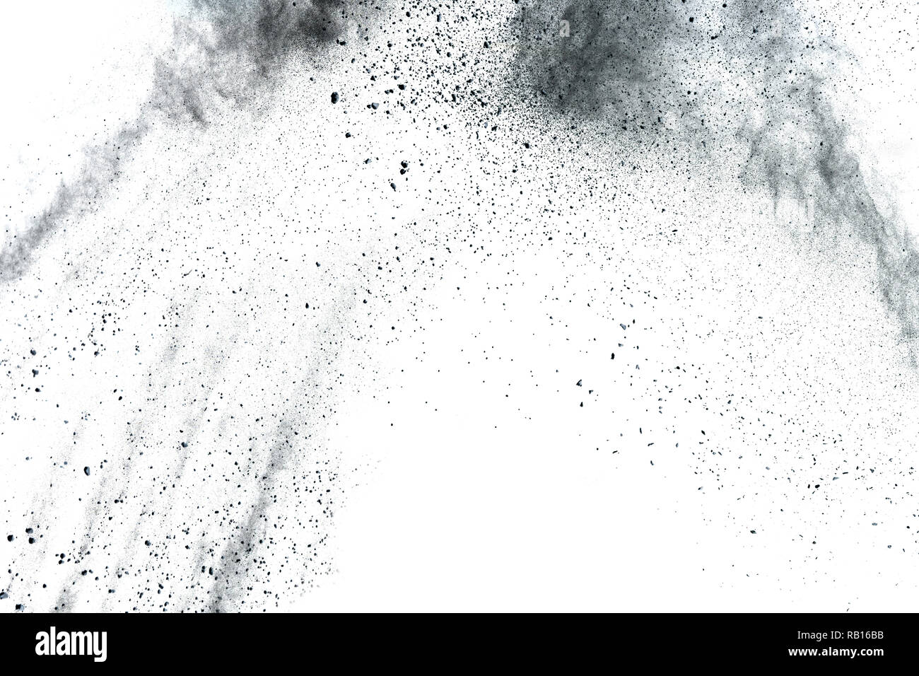 Closeup of black dust particles explode isolated on white background ...