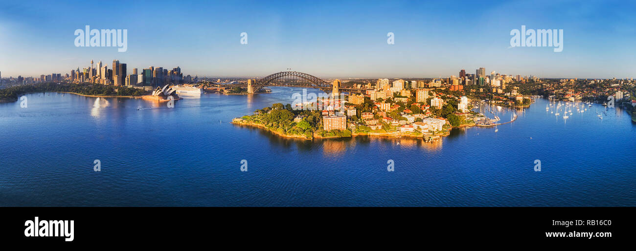 Blue waters of Sydney harbour between Lower north Shore and city CBD ...