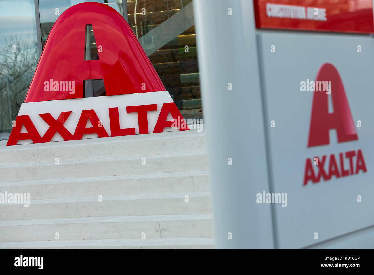 A logo sign outside of a facility occupied by Axalta Coating Systems in ...