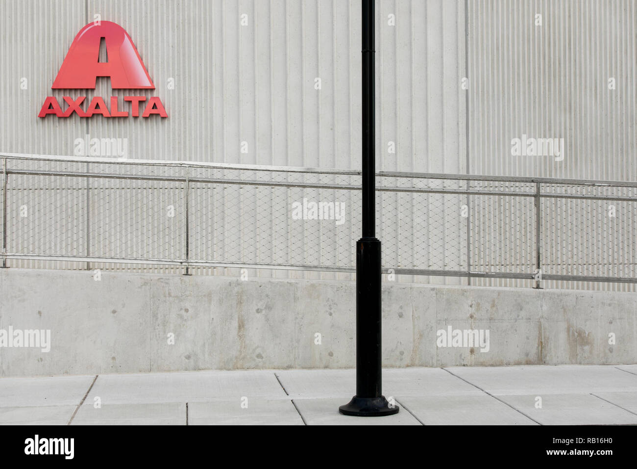 A logo sign outside of a facility occupied by Axalta Coating Systems in ...