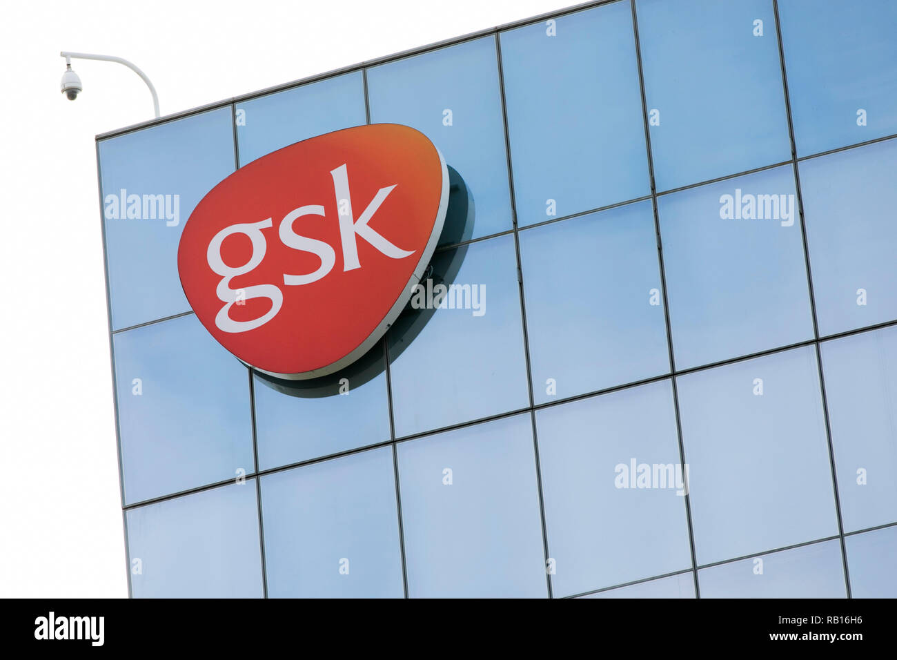 A logo sign outside of a facility occupied by GlaxoSmithKline (GSK) in ...