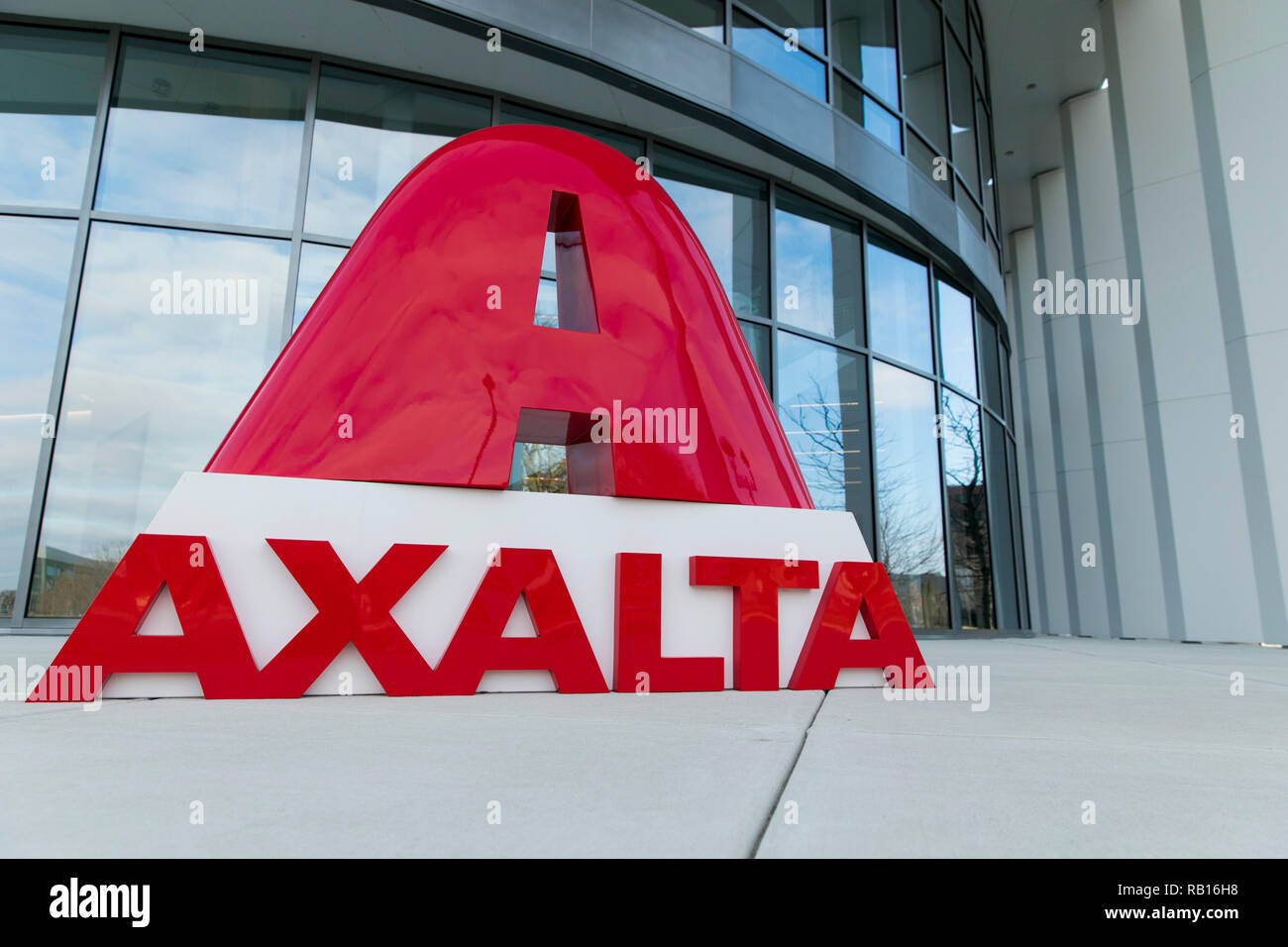 A logo sign outside of a facility occupied by Axalta Coating Systems in ...