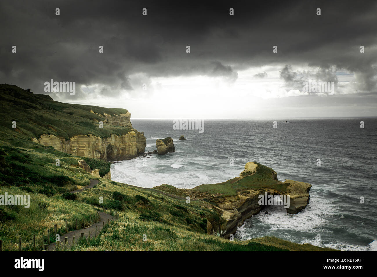 Tunnel beach view during cloudy weather, Dunedin, New Zealand Stock ...