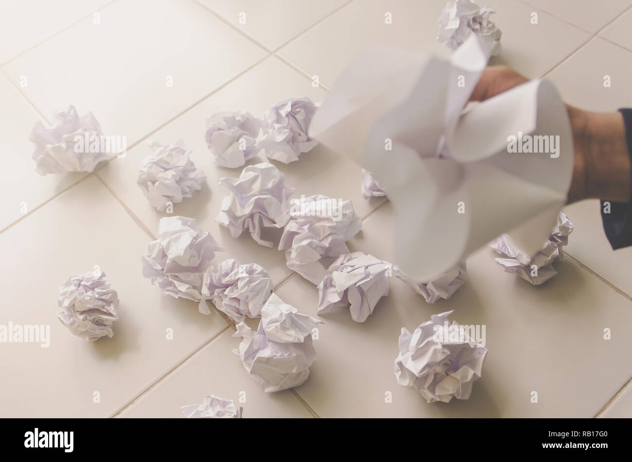 No idea and fail concept - Human hand holding crumpled paper or trash ...