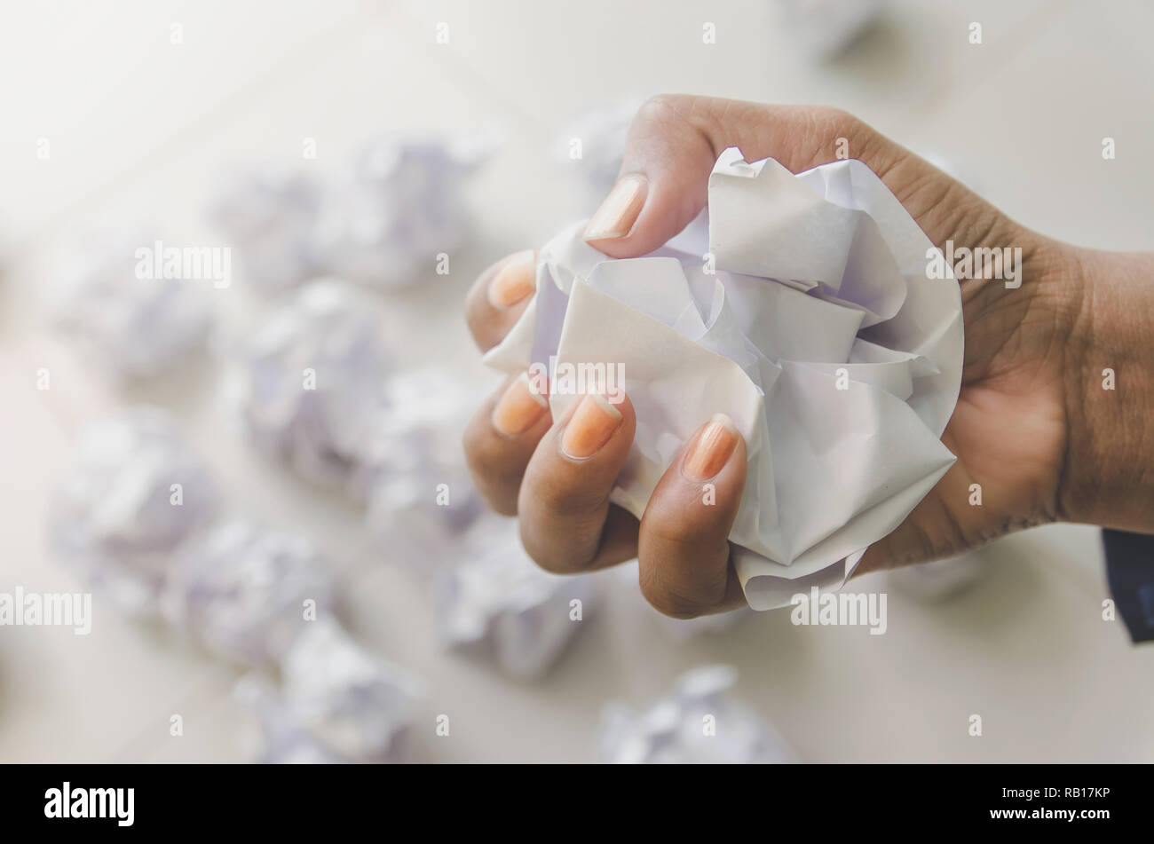 No idea and fail concept - Human hand holding crumpled paper or trash ...