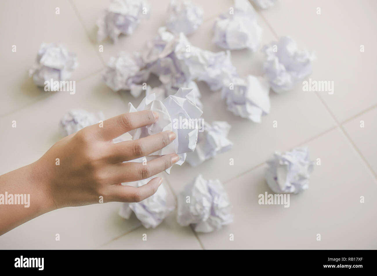 Hand holding crumpled sheet of paper hi-res stock photography and ...