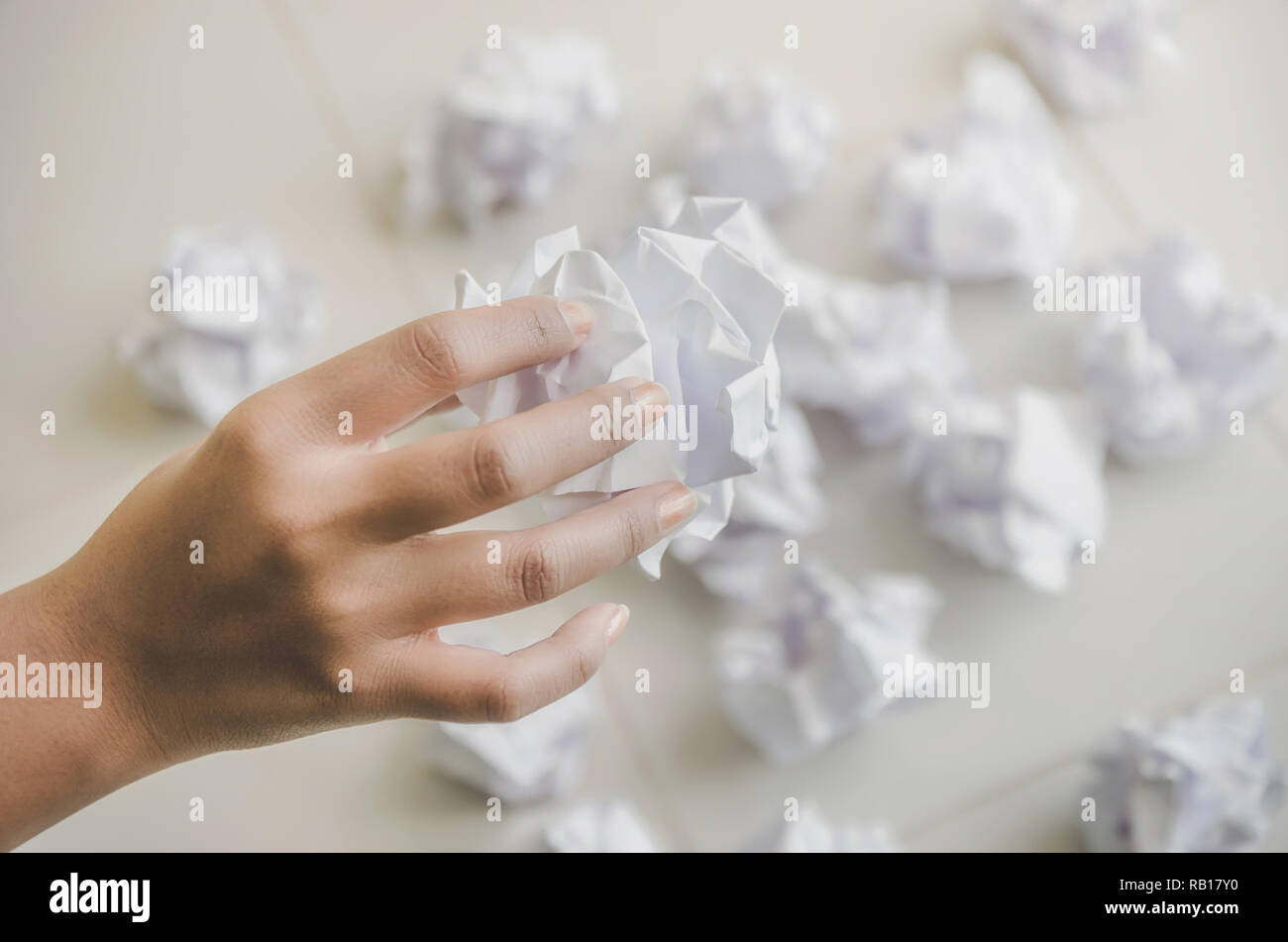 No idea and fail concept - Human hand holding crumpled paper or trash ...