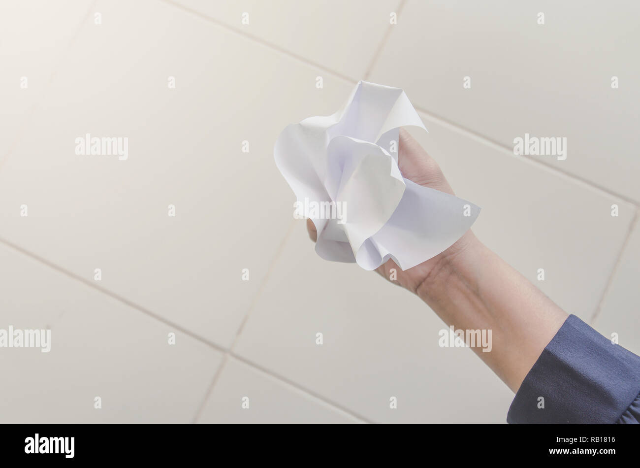 No idea and fail concept - Human hand holding crumpled paper or trash ...