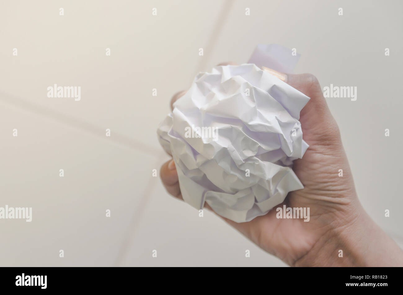 No idea and fail concept - Human hand holding crumpled paper or trash ...