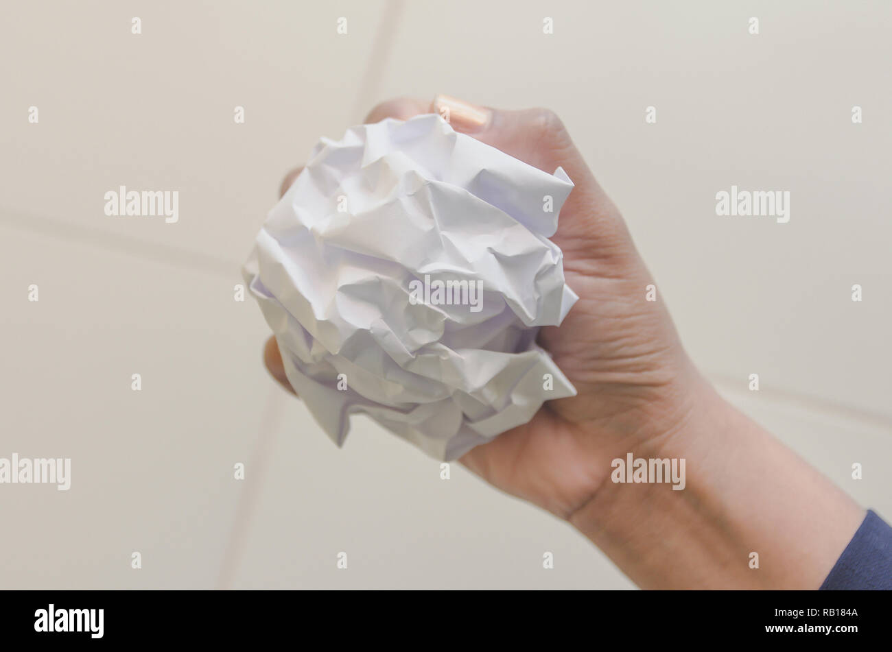 No idea and fail concept - Human hand holding crumpled paper or trash ...