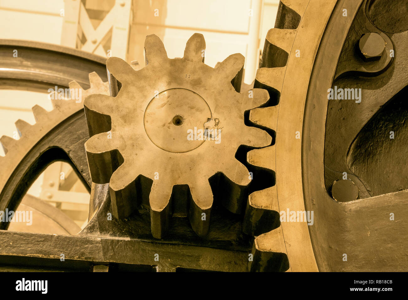 teeth of big cog wheels merge together Stock Photo - Alamy