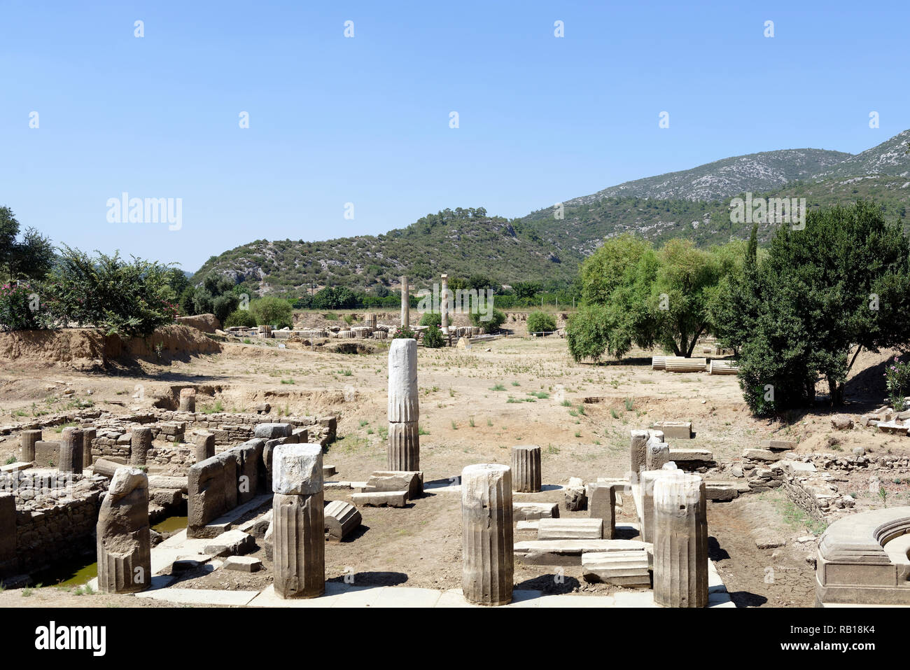 The Propylon – entrance and Temple of Apollo in the background, ancient ...