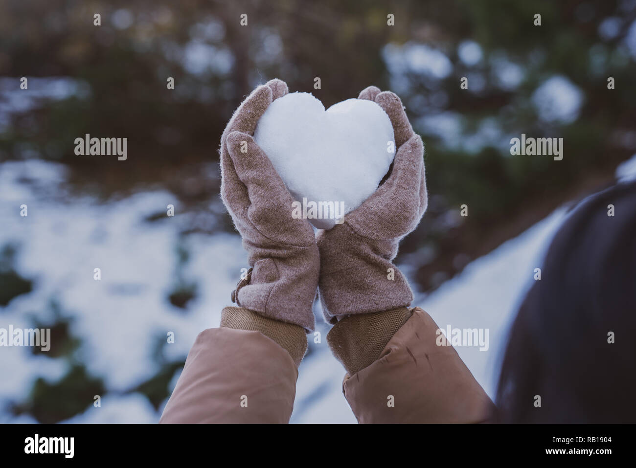 Woman making beautiful snow hi-res stock photography and images - Alamy