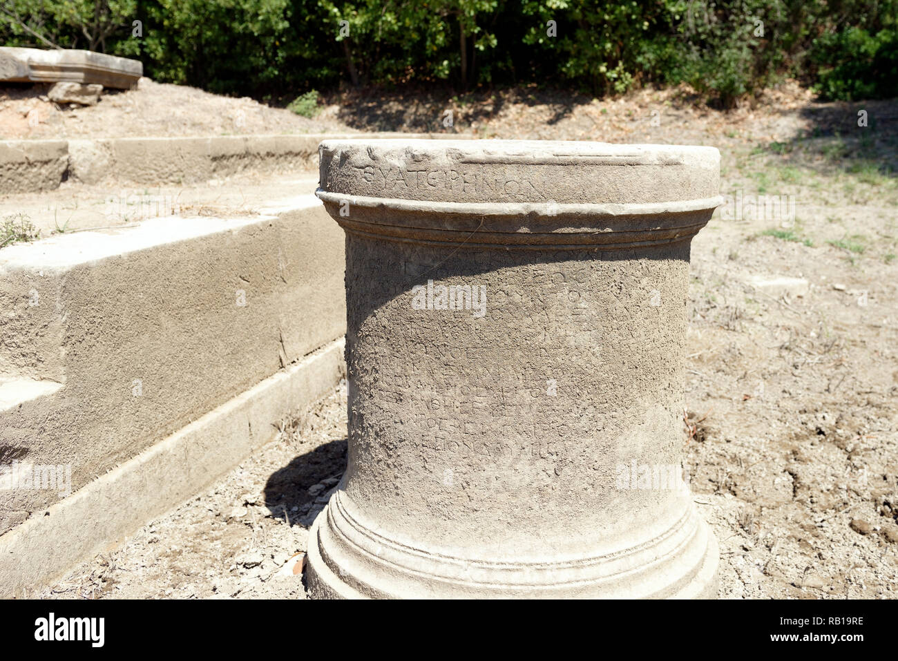 Ancient Greek Inscribed monument base beside at the ancient Greek ...
