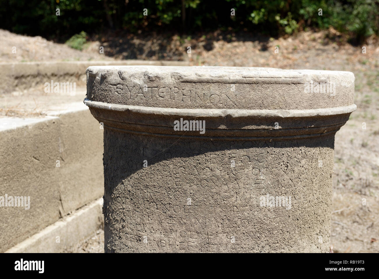Ancient Greek Inscribed monument base beside at the ancient Greek ...