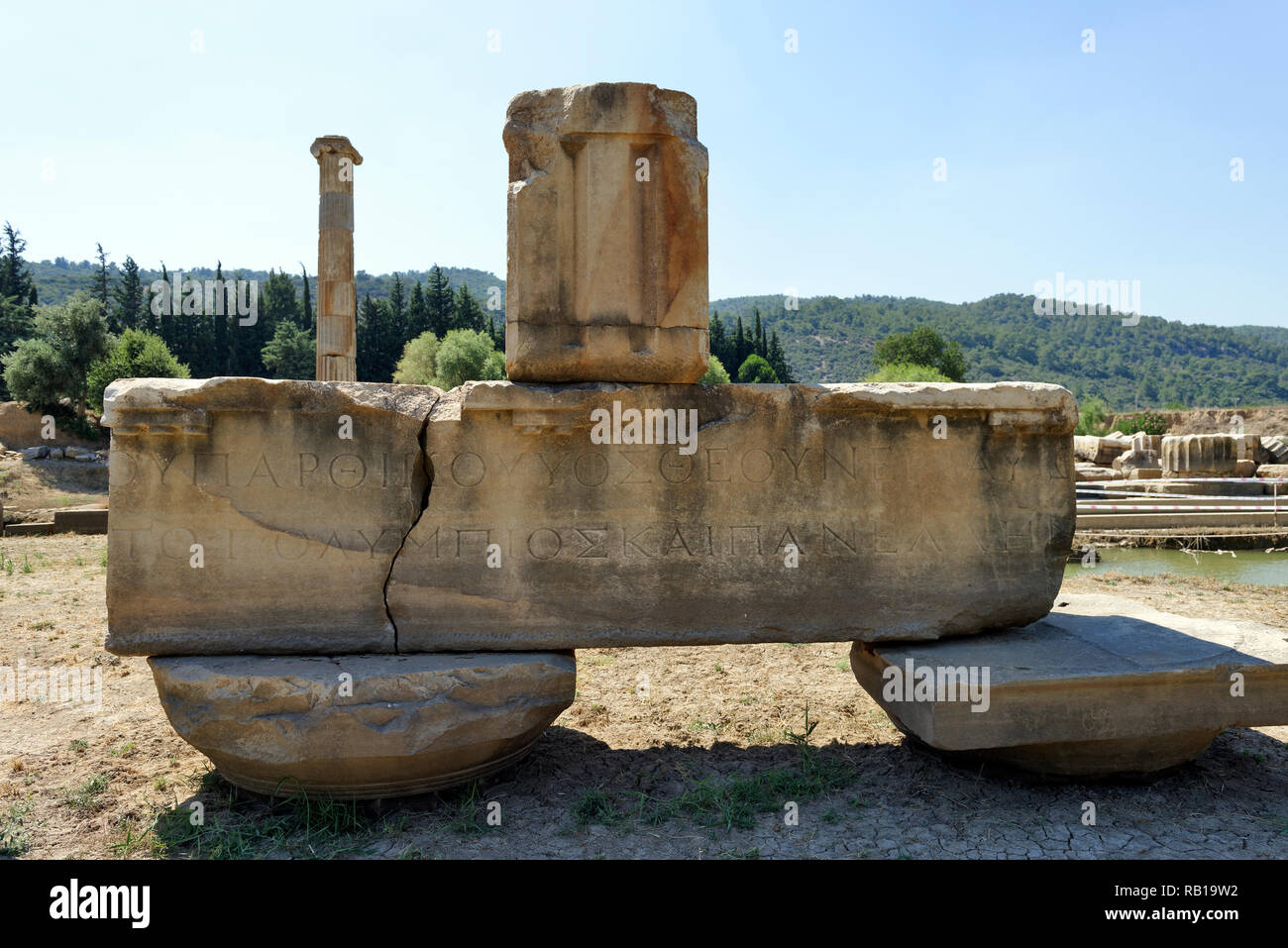 Ancient Greek text inscriptions on a large fragment of stone artefact ...
