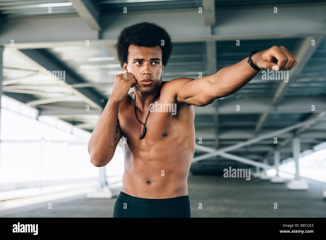 Throwing a punch hi-res stock photography and images - Alamy