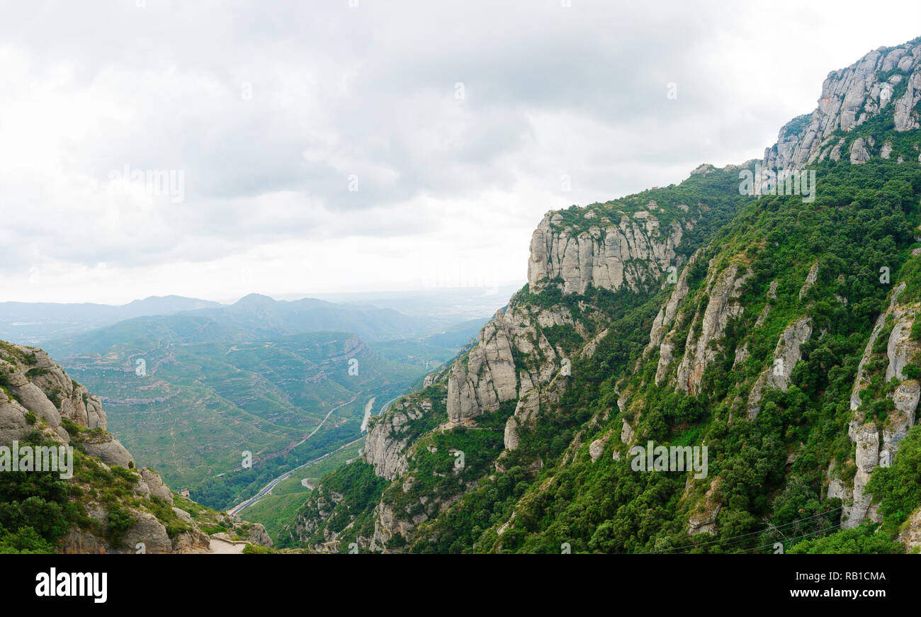 Rock formation and green vegetation landscape hi-res stock photography ...