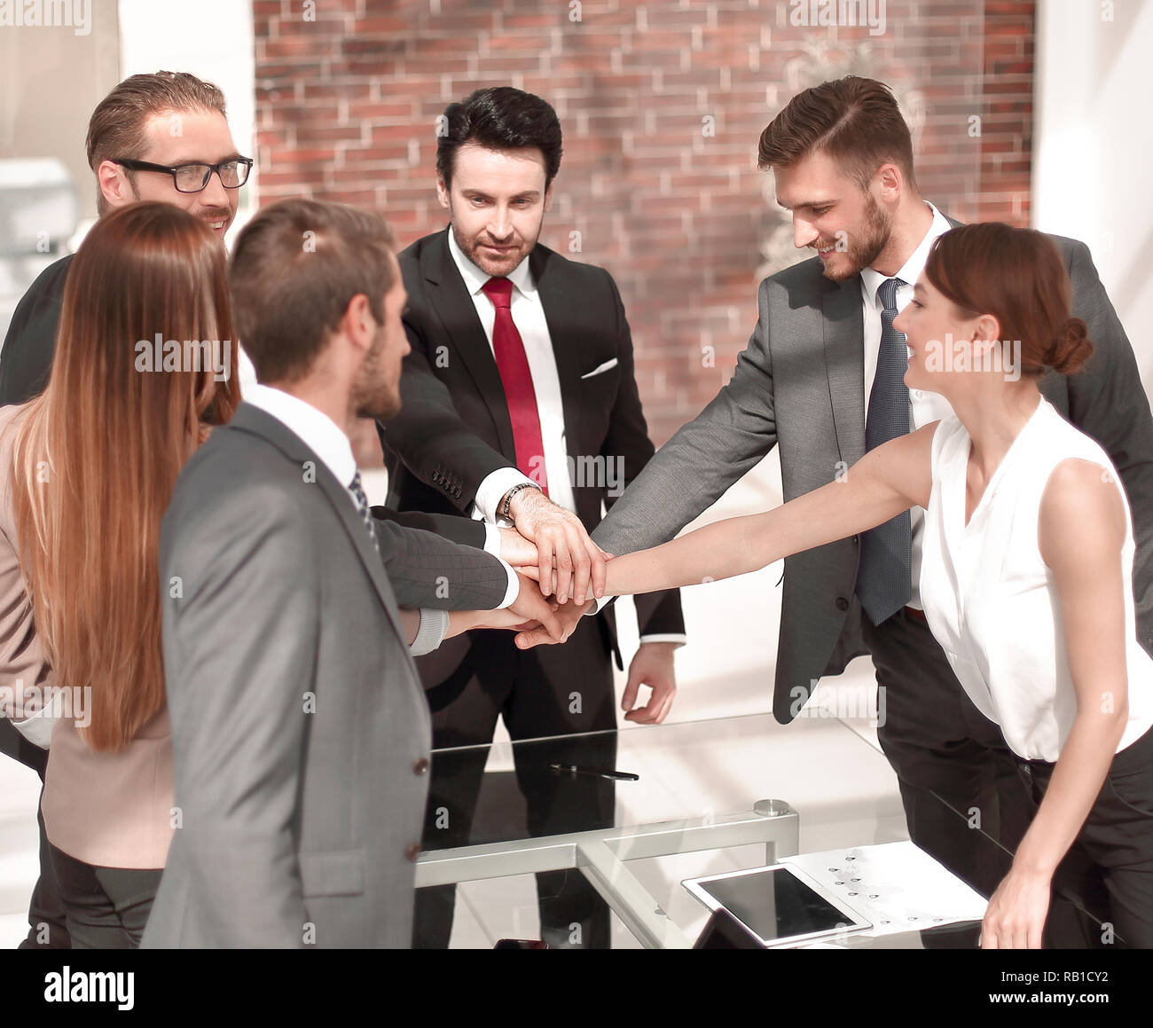 professional business team showing their unity Stock Photo - Alamy