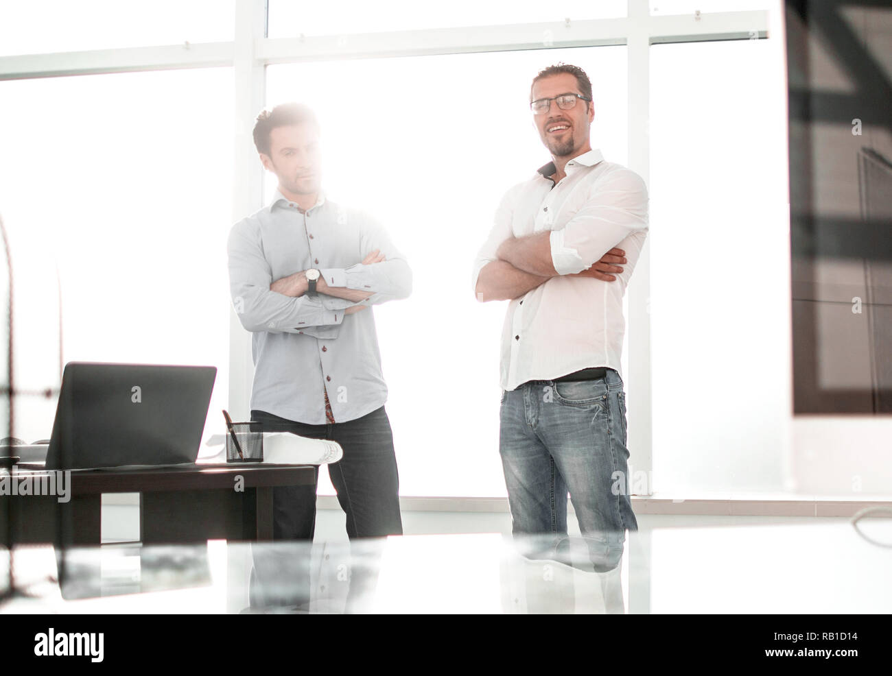 business background.two employees standing in a modern office Stock ...