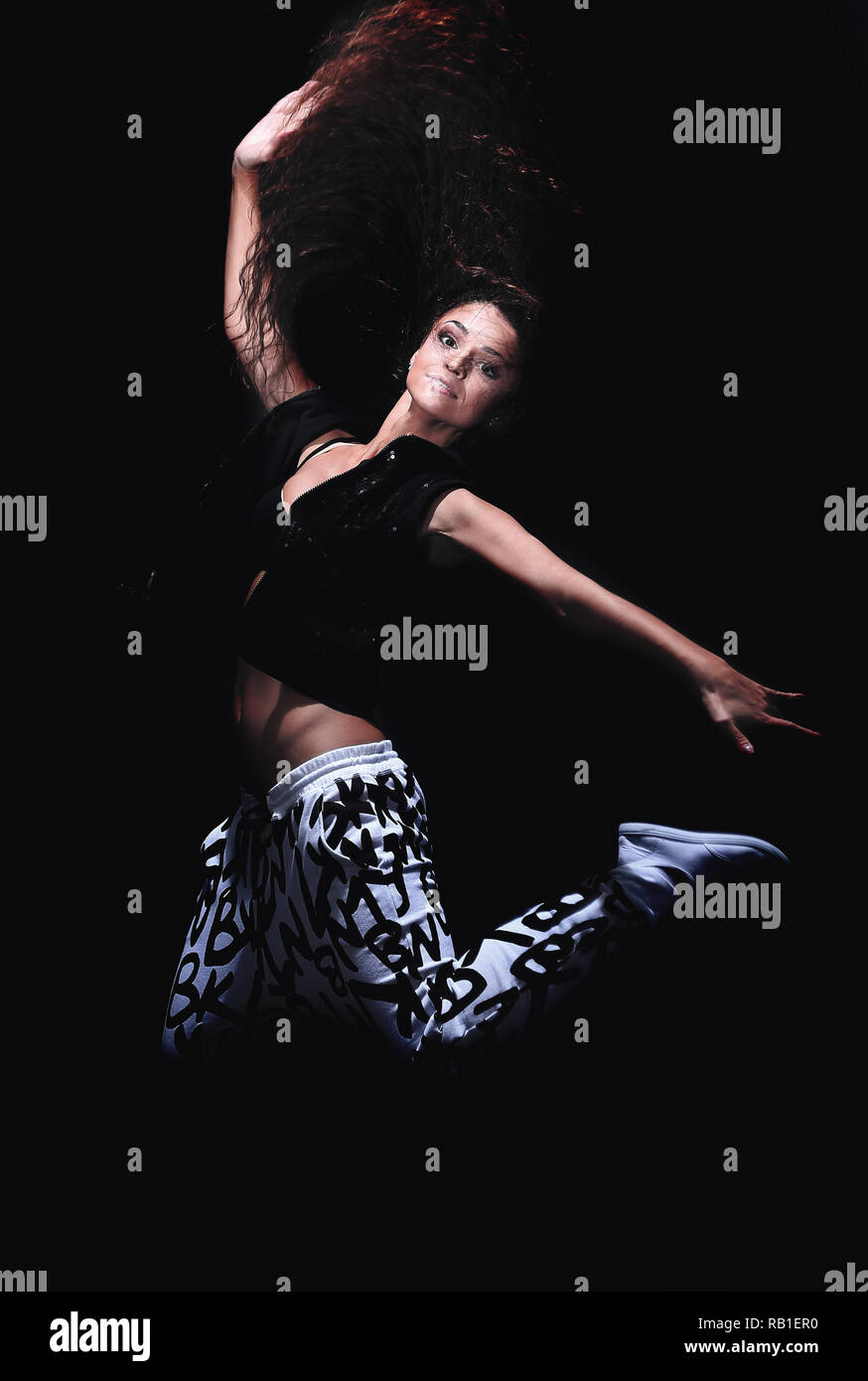Woman dancing street dance Stock Photo - Alamy