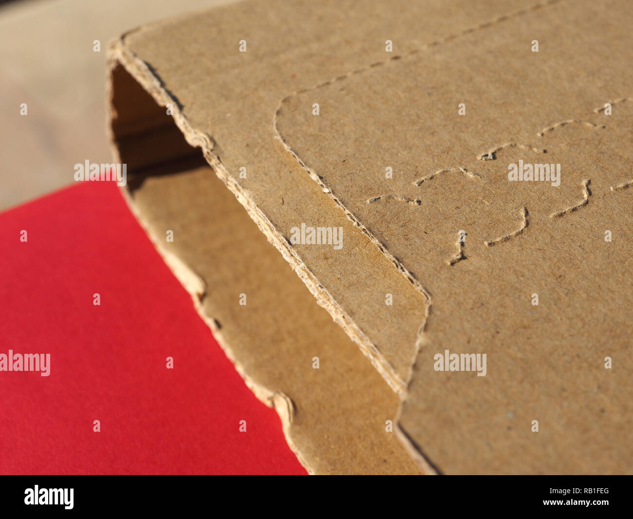 corrugated cardboard box for small packet parcel Stock Photo - Alamy
