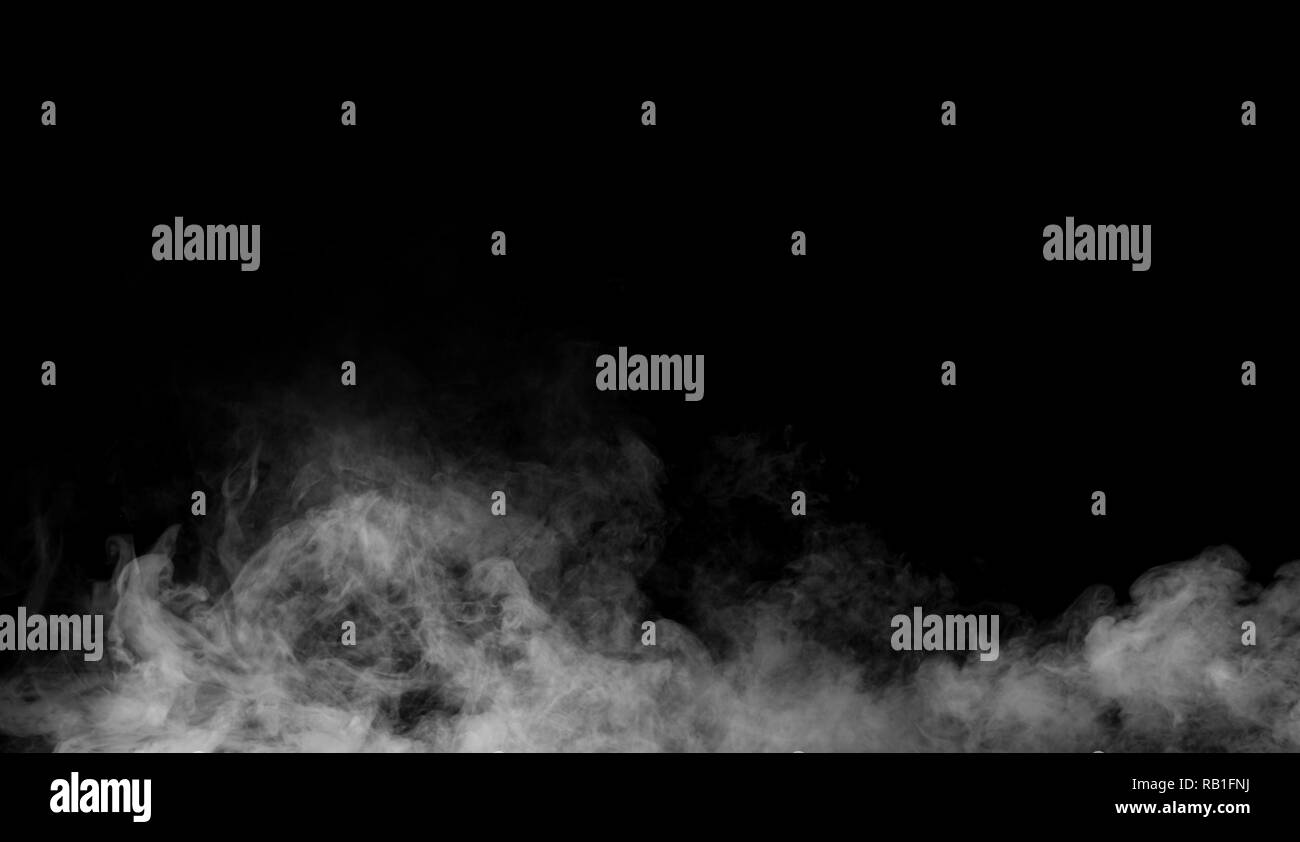 Smoke on the floor . Isolated black background Stock Photo - Alamy